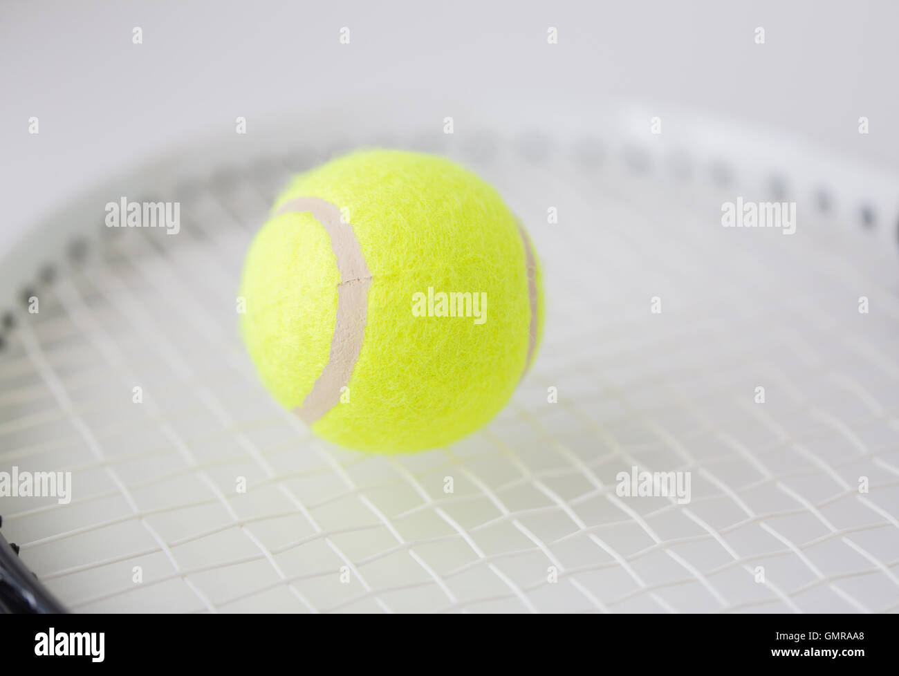 close up of tennis racket with ball Stock Photo - Alamy