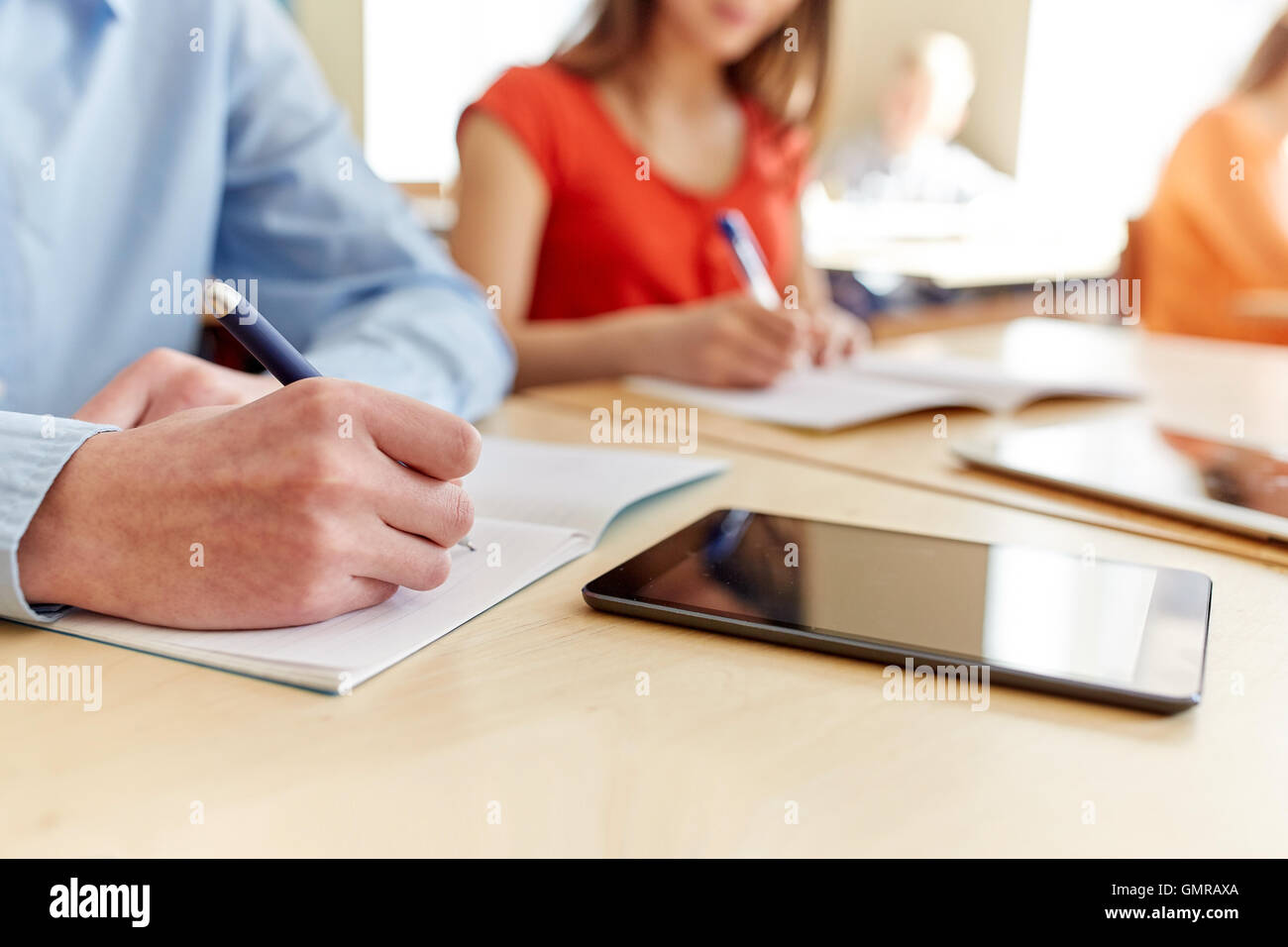 Students hand writing hi-res stock photography and images - Alamy