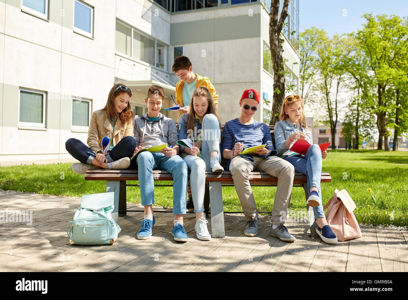group of students with notebooks at school yard Stock Photo - Alamy