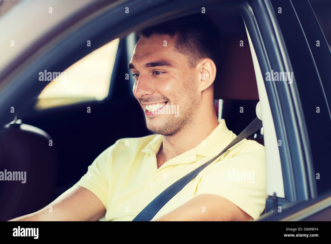 happy smiling man driving car outdoors Stock Photo - Alamy