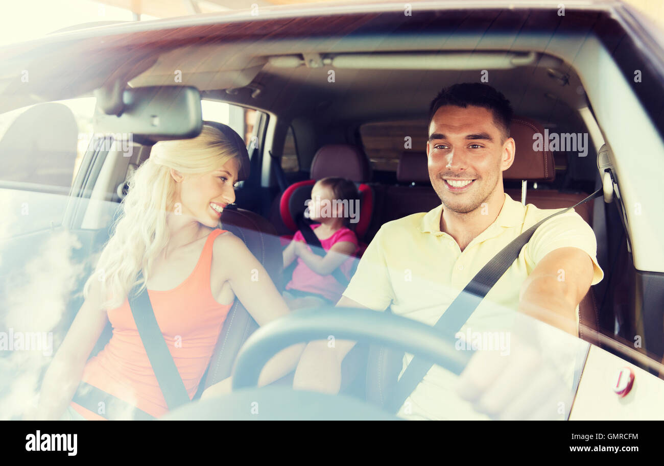 happy family with little child driving in car Stock Photo - Alamy