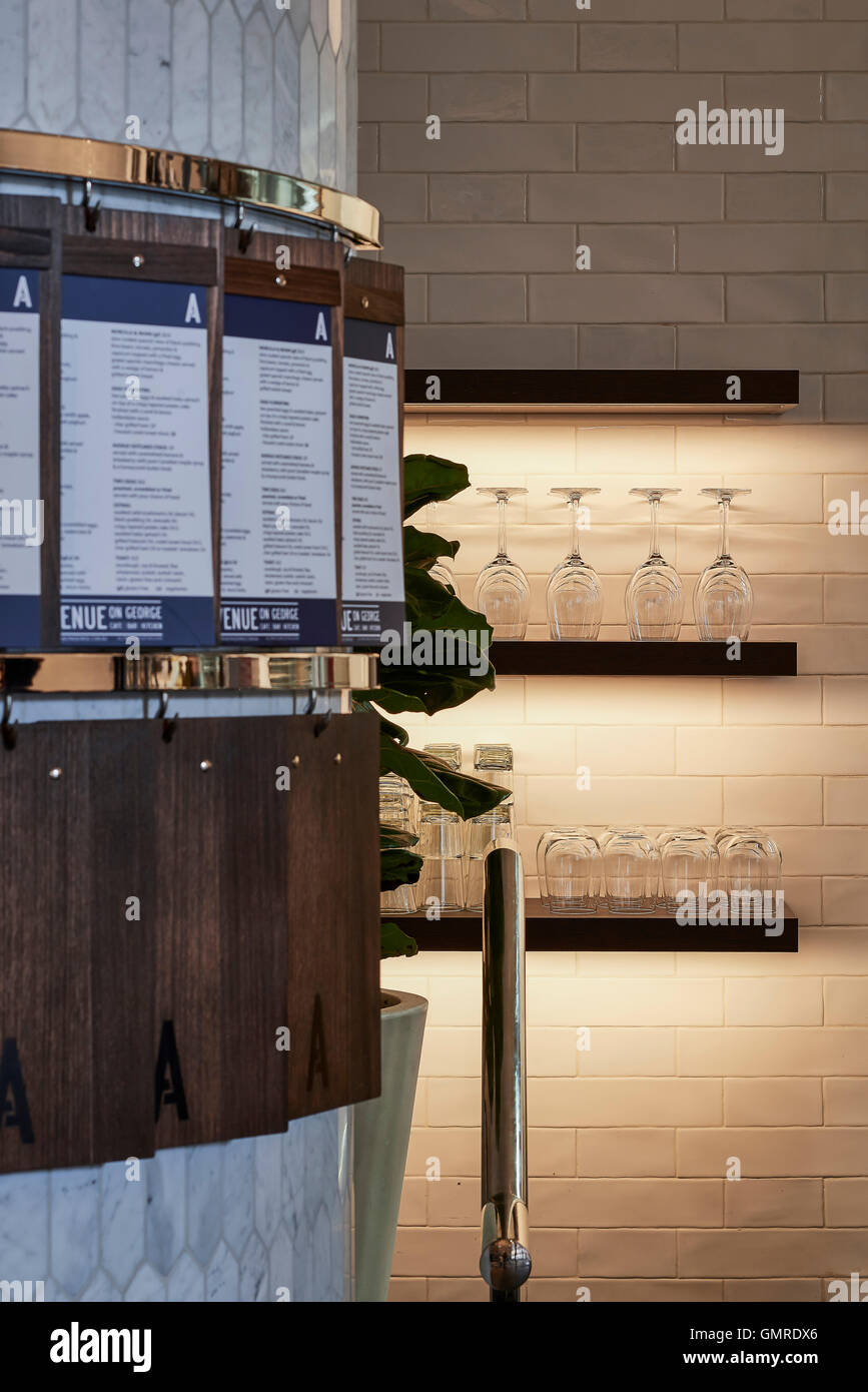 Shelves with highlight lighting and menu storage on feature column ...