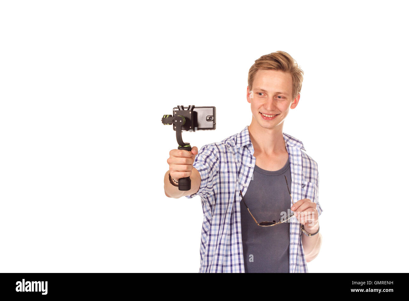 Man holds small action camera on gimbal. Isolated on white Stock Photo ...