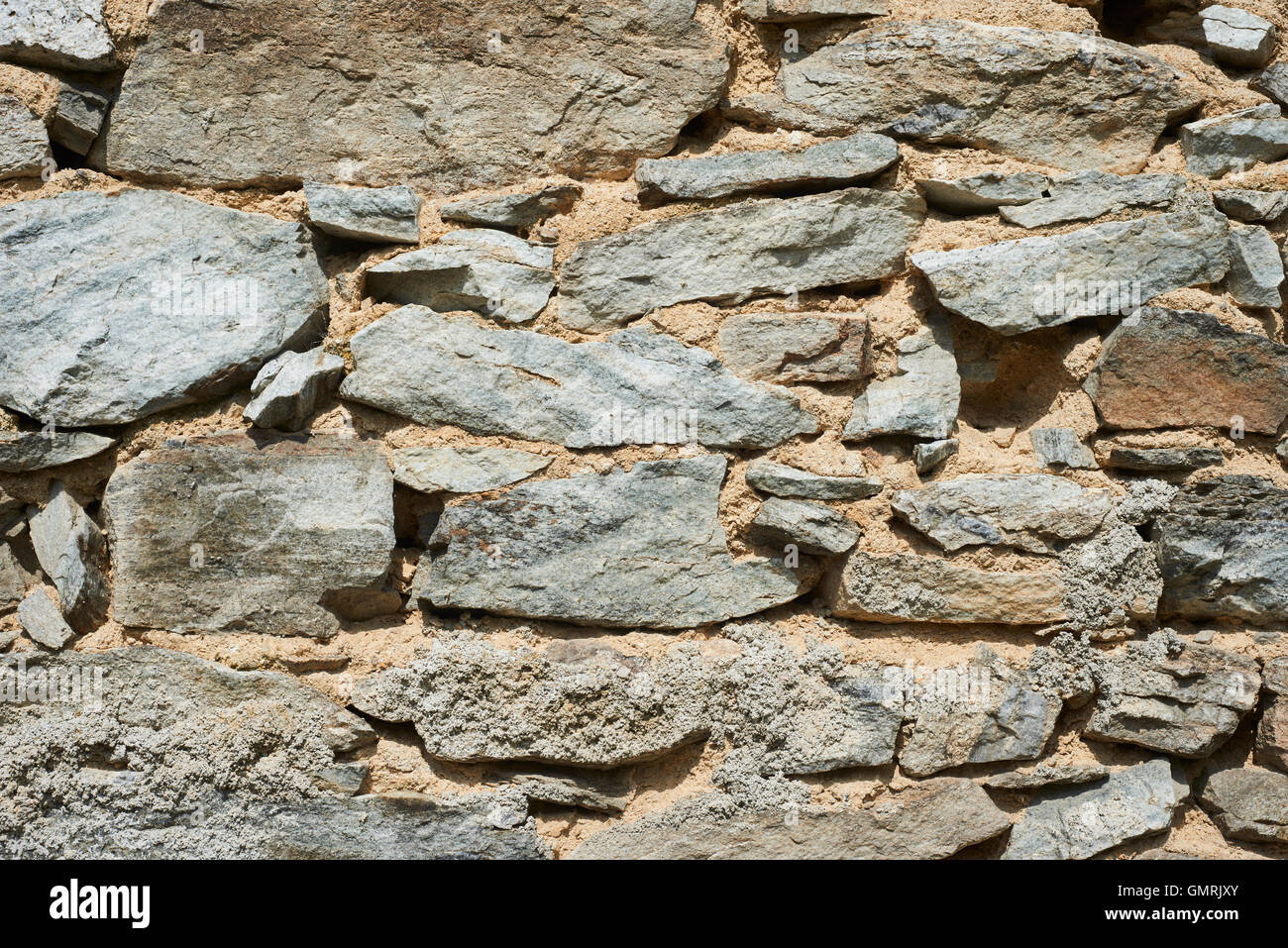 Weathered antique old cracked stone blocks wall retro background Stock ...