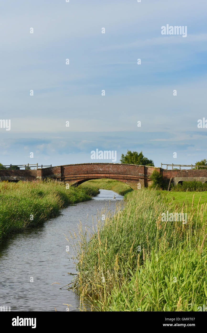 A brick bridge over the River Cuckmere, near Alfriston in East Sussex ...