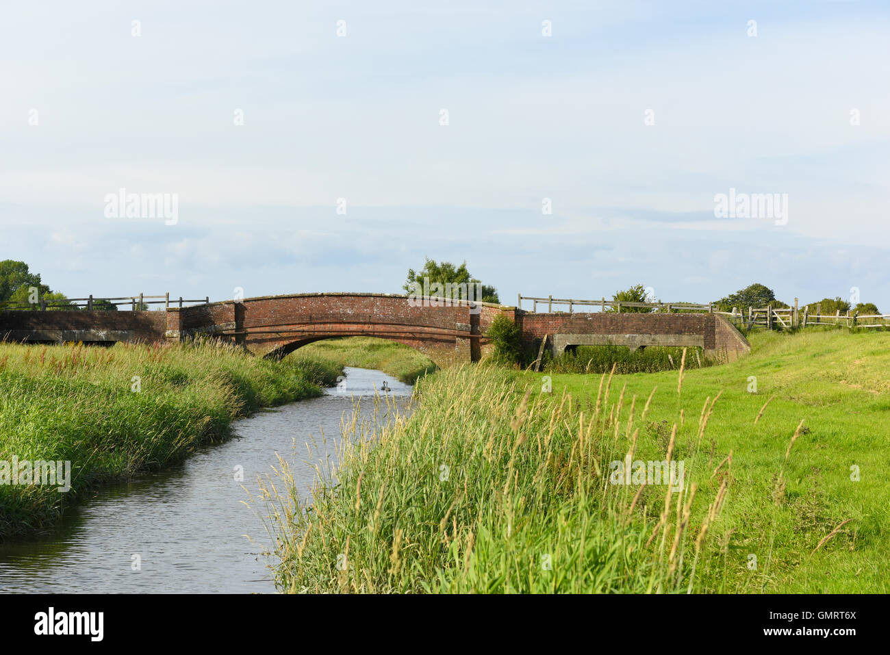 A brick bridge over the River Cuckmere, near Alfriston in East Sussex ...