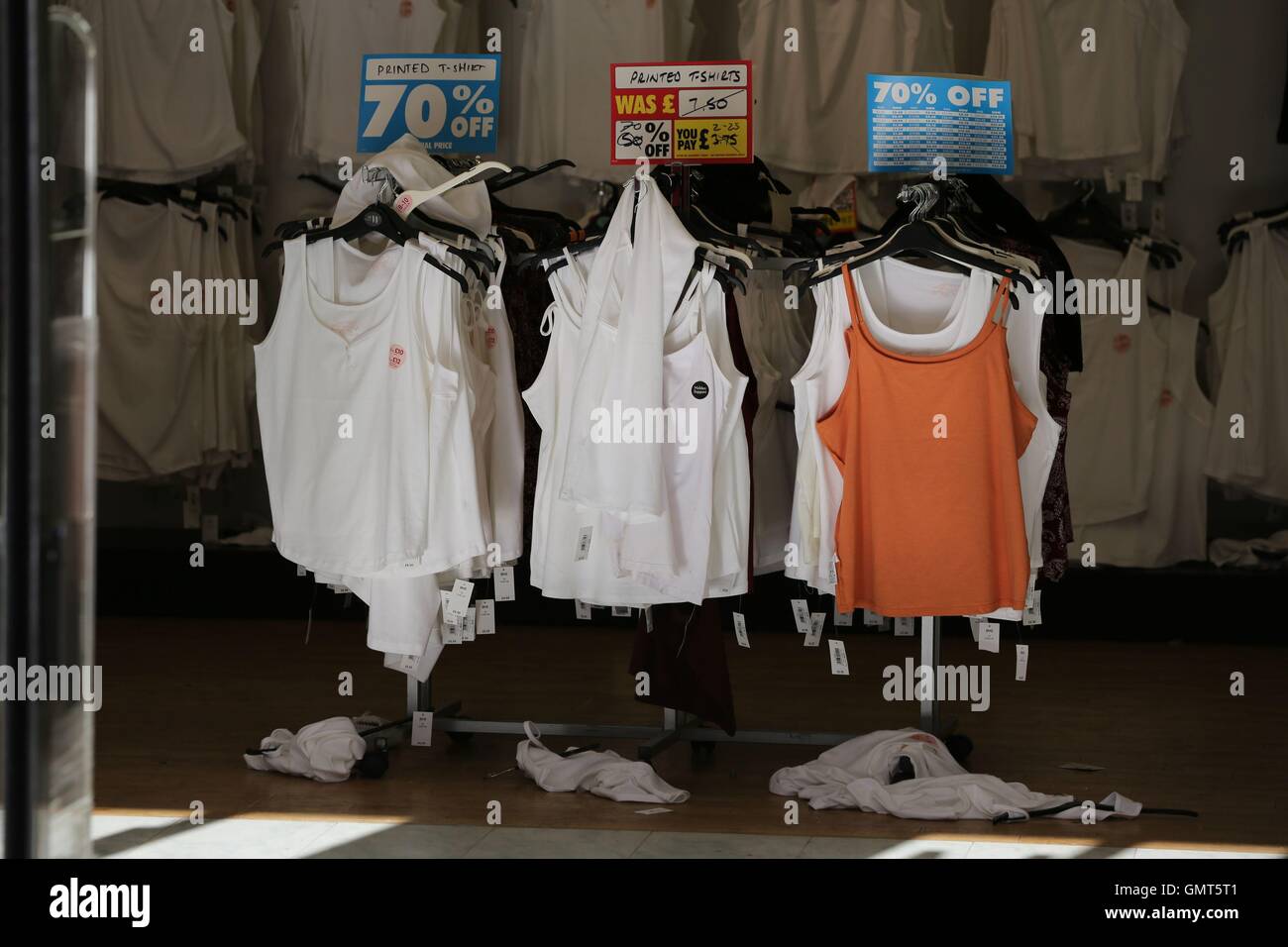 Clothes racks are seen inside the BHS store in Wood Green, London, as ...