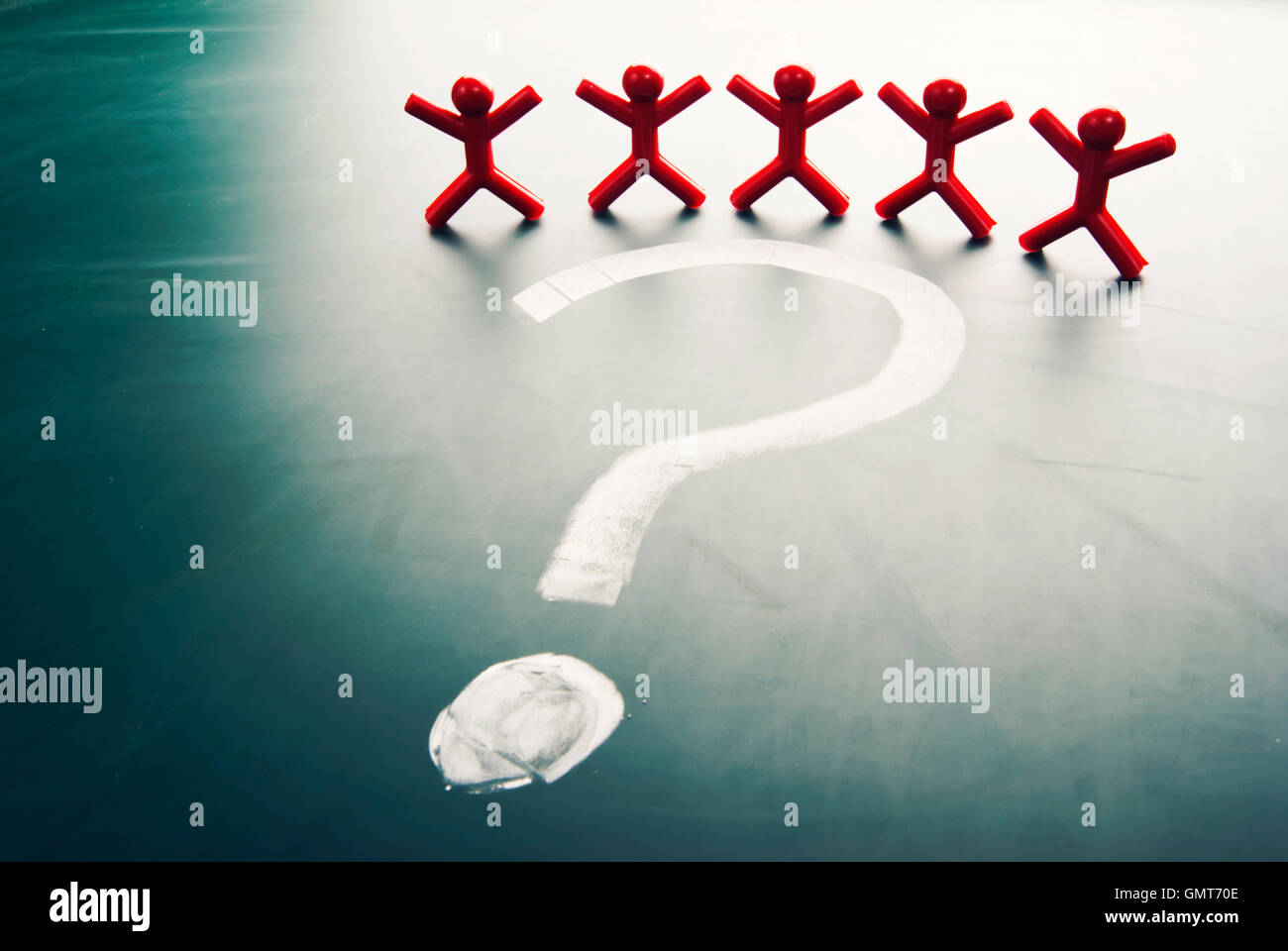 Business team face question mark Stock Photo - Alamy