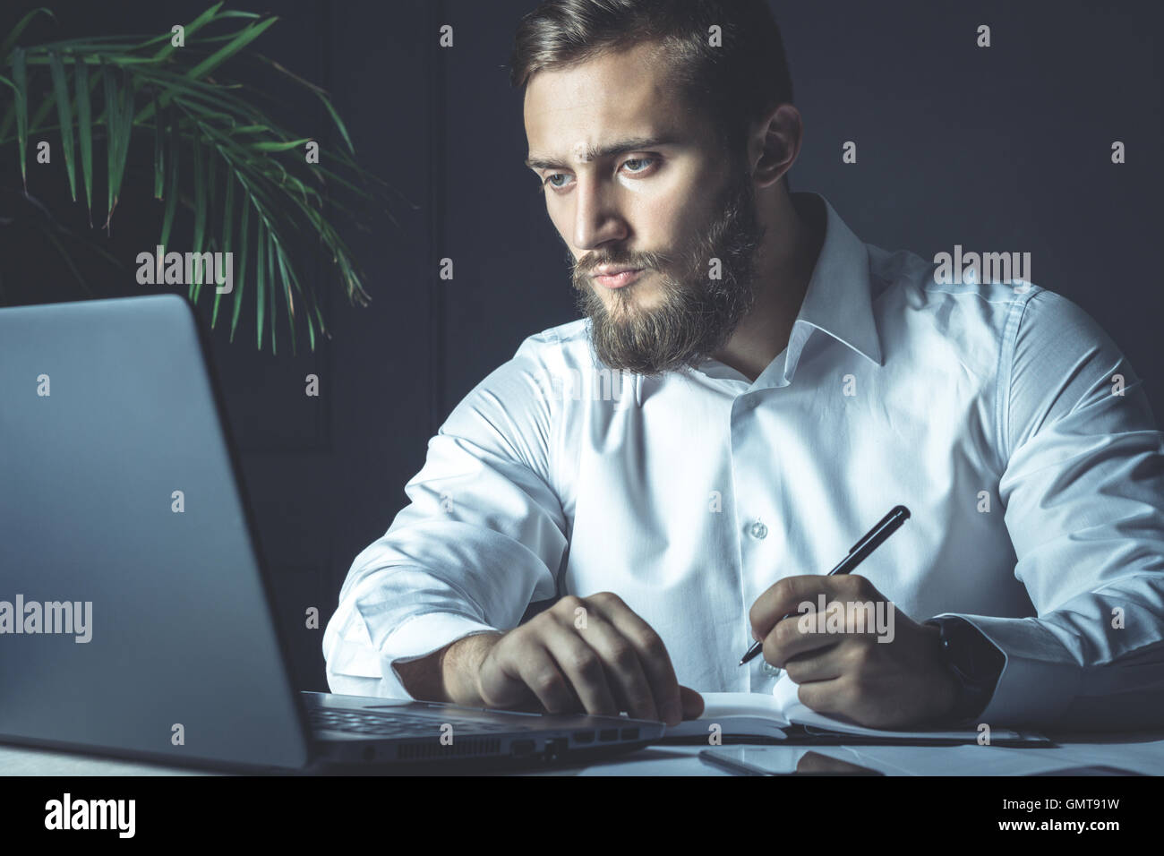 Handsome Young Bearded Businessman Stock Photo - Alamy