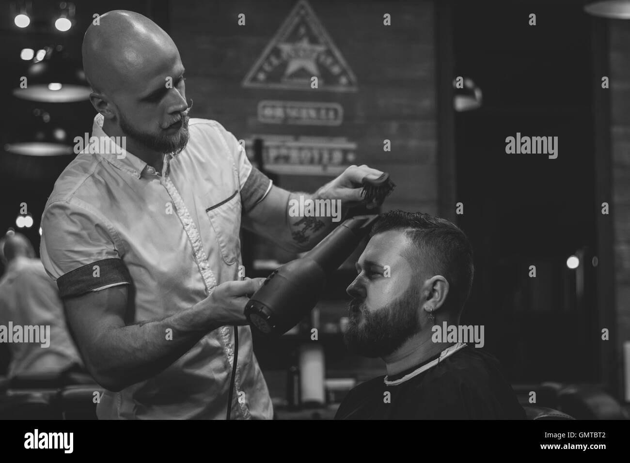 Barber shop customer Black and White Stock Photos & Images - Alamy