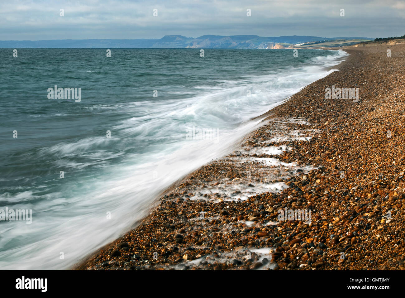 A view of Chesil Beach in Dorset, UK, part of the Jurassic Coast, near ...