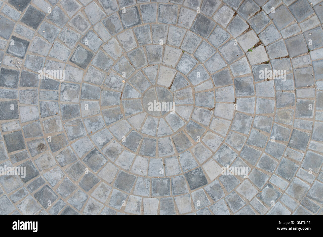 Cobble circular pattern block pavement texture background. Top view ...
