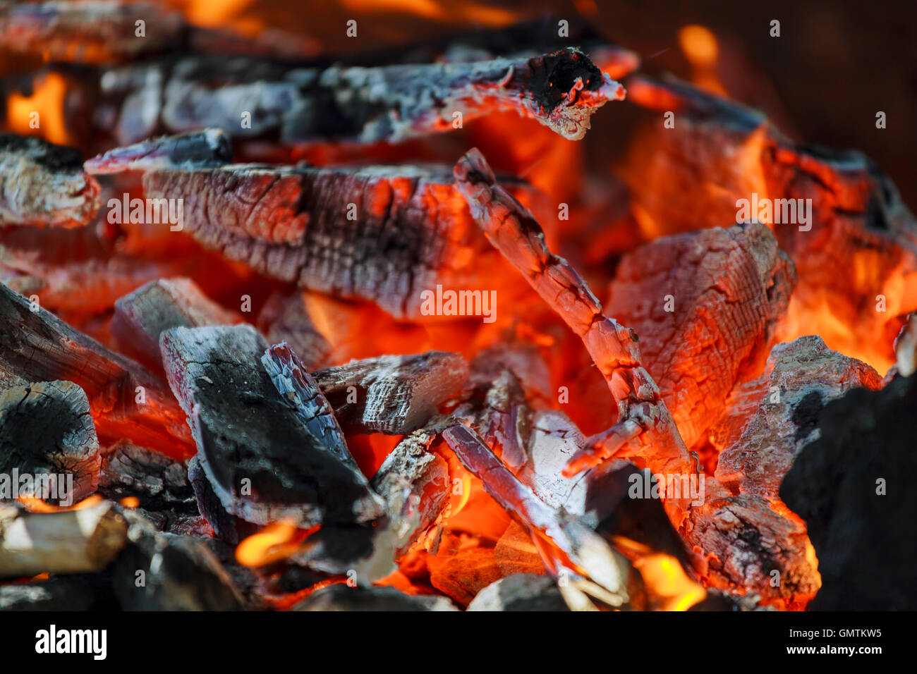 Glowing coals in a barbeque grill coal fire smoke Stock Photo - Alamy