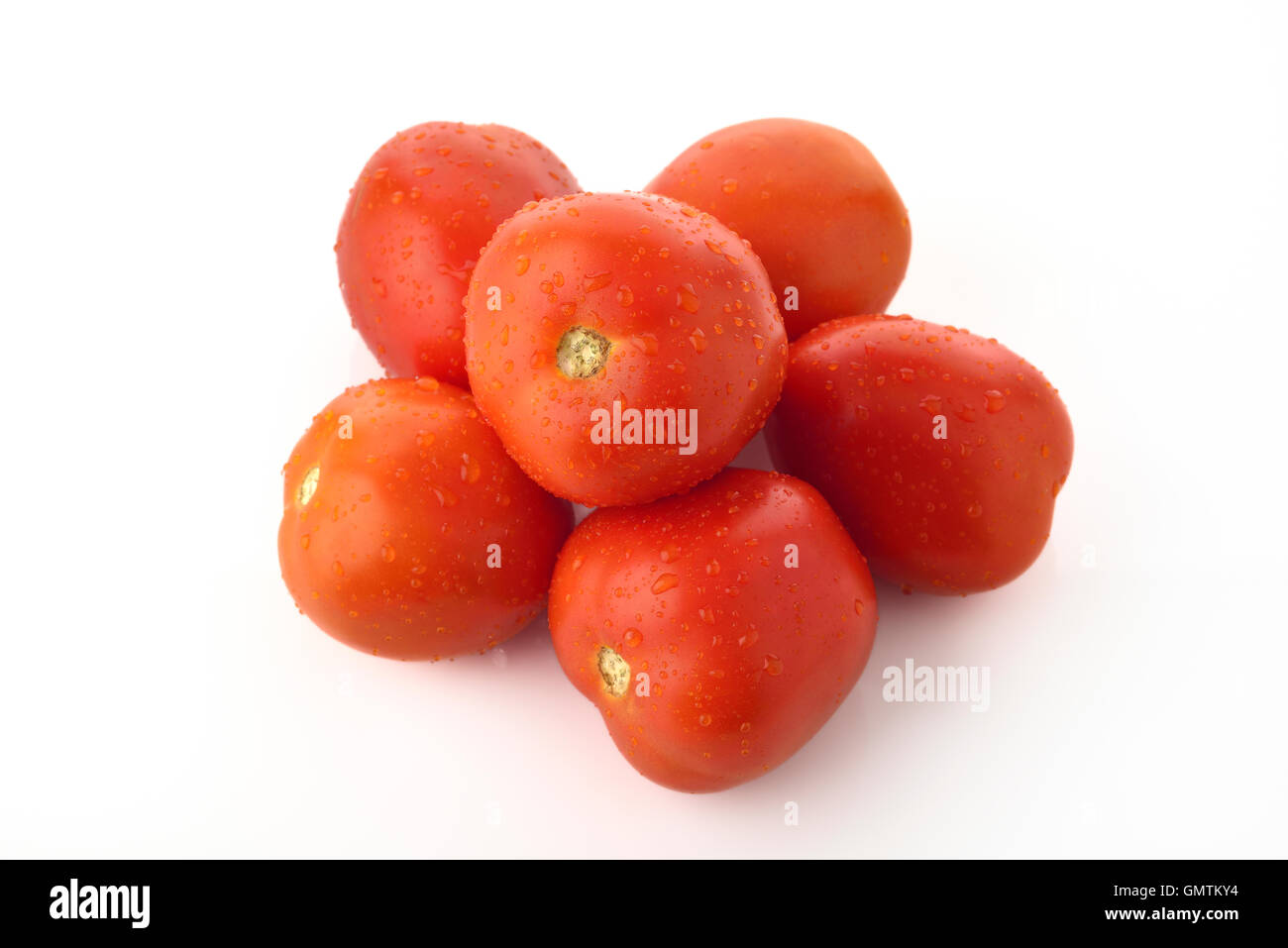 Tomatoes Stacked on White Background shot in Studio Stock Photo - Alamy