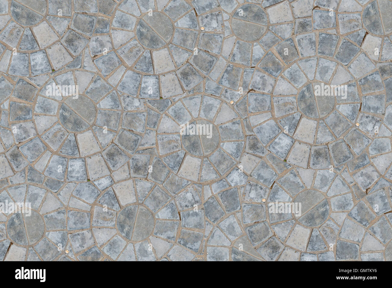 Cobble circular pattern block pavement texture background. Top view ...