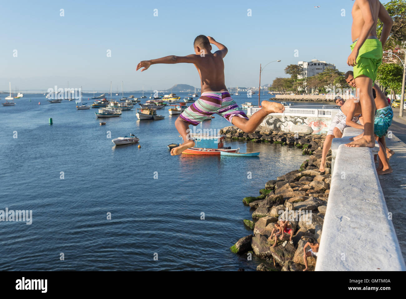 Harbour boys diving jumping hi-res stock photography and images - Alamy