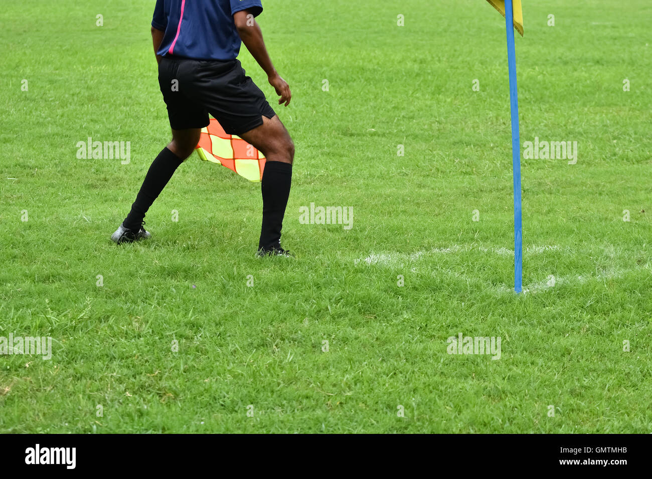 Assistant referee running along the sideline Stock Photo - Alamy