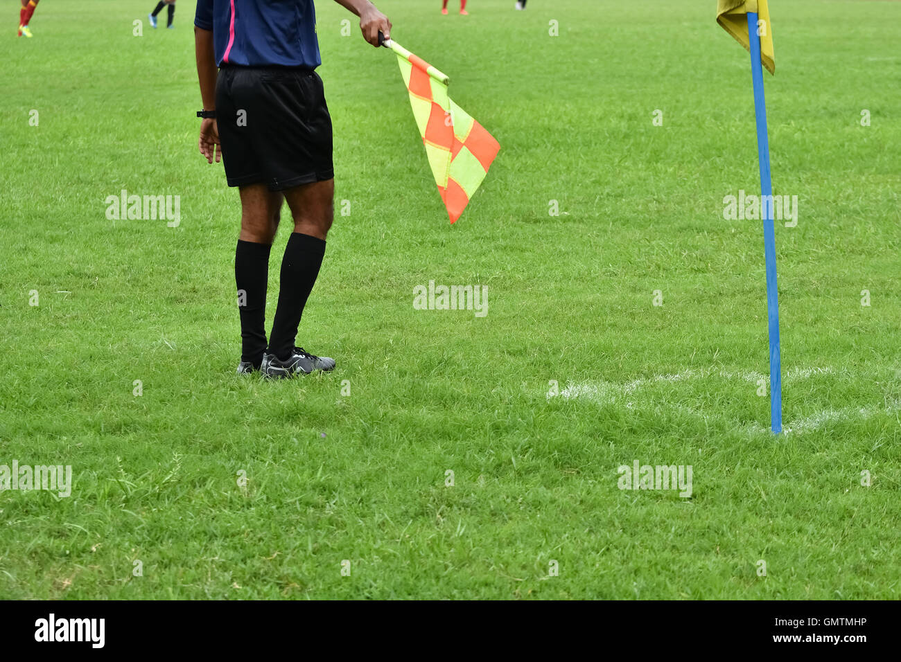 Assistant referee running along the sideline Stock Photo - Alamy