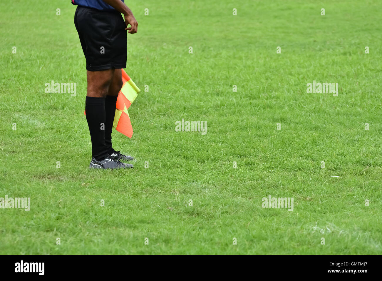 Assistant referee running along the sideline Stock Photo - Alamy