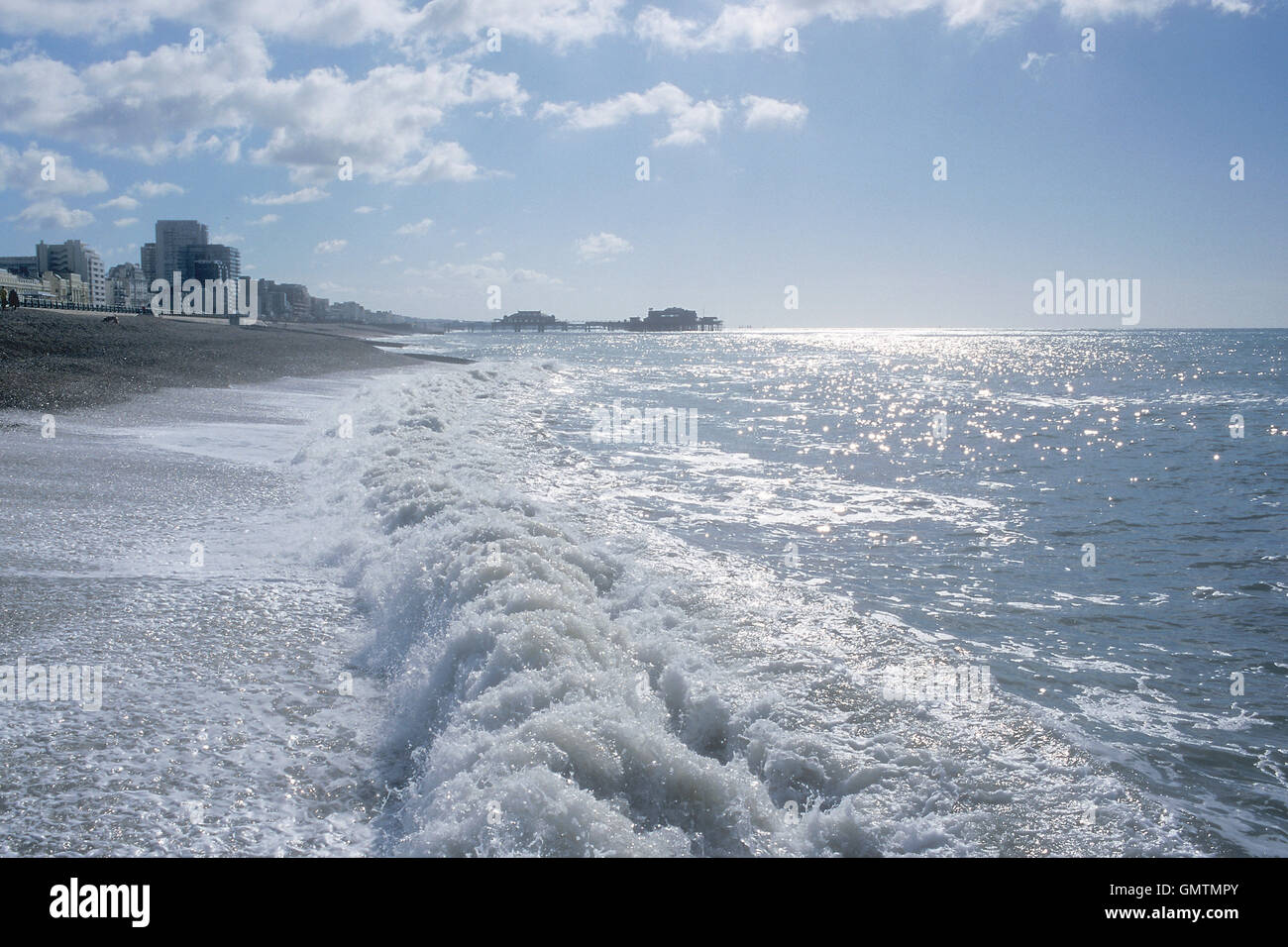 Brighton beach at high tide Stock Photo - Alamy