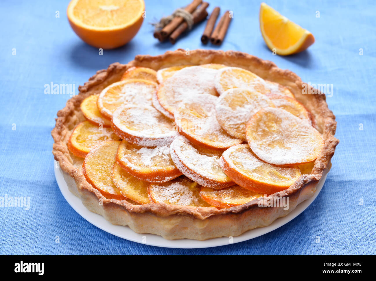Orange pie on blue background hi-res stock photography and images - Alamy
