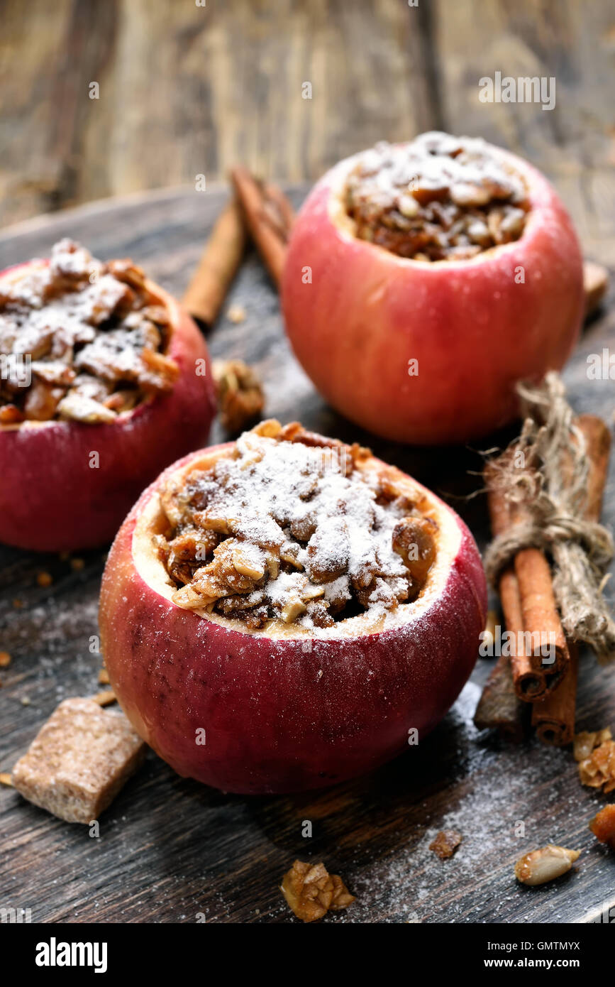 Baked red apples stuffed with granola, healthy dessert Stock Photo - Alamy