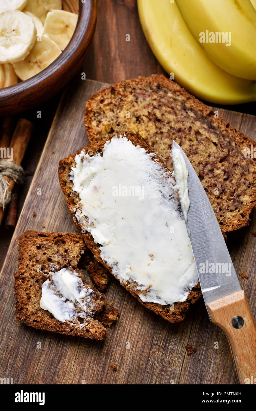 Butter on slice of sweet banana bread Stock Photo - Alamy