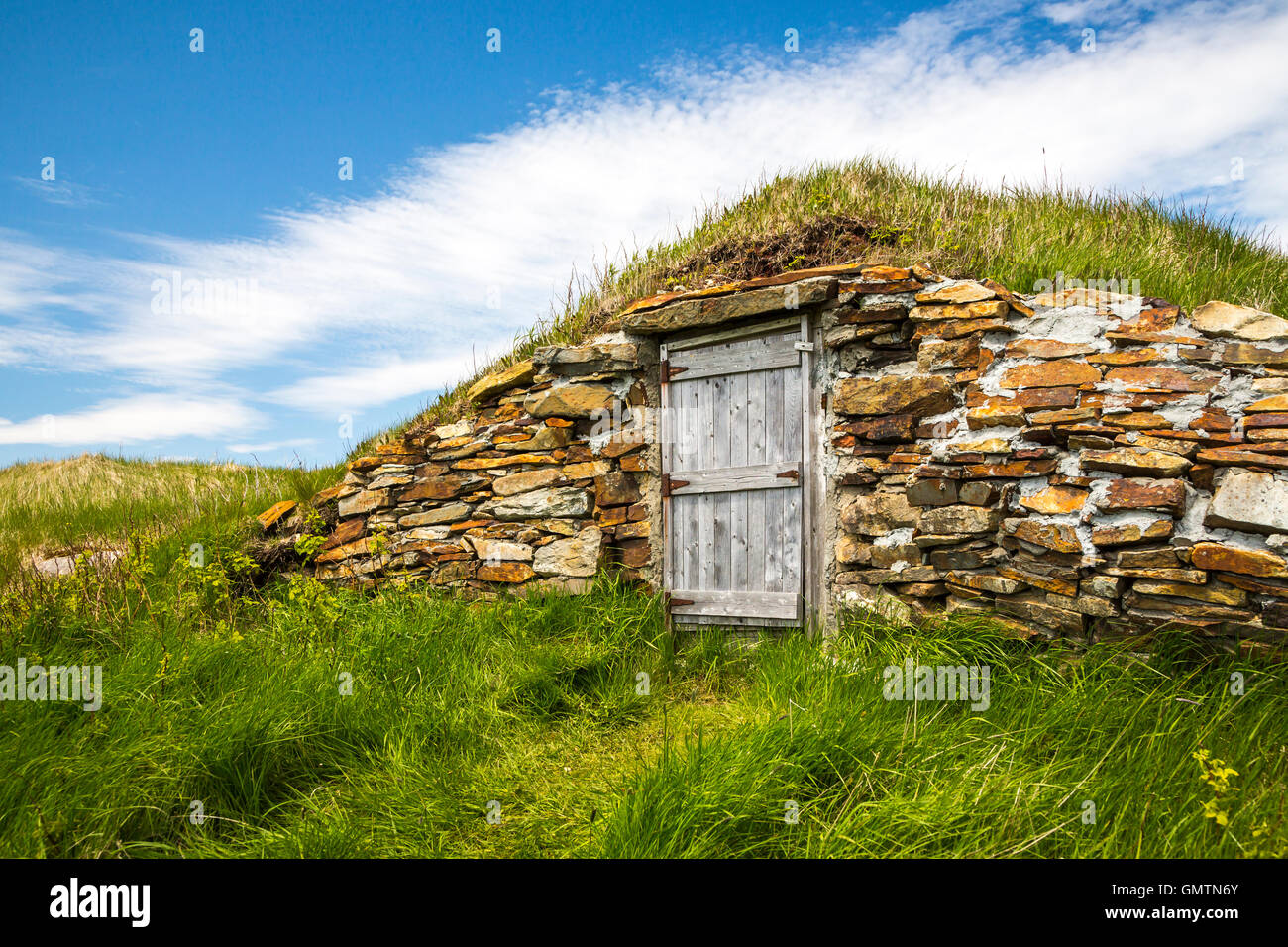 An in-ground root cellar at Elliston, Newfoundland and Labrador, Canada ...