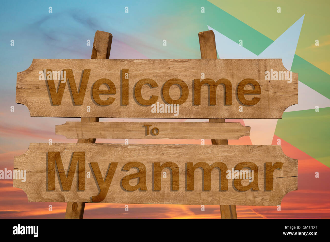 Welcome to Myanmar sign on wood background with blending national flag ...
