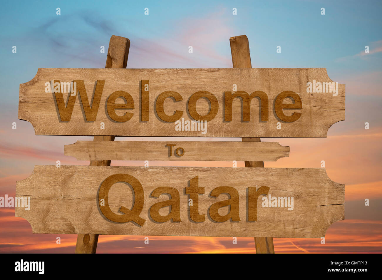 Welcome to Qatar sign on wood background Stock Photo - Alamy