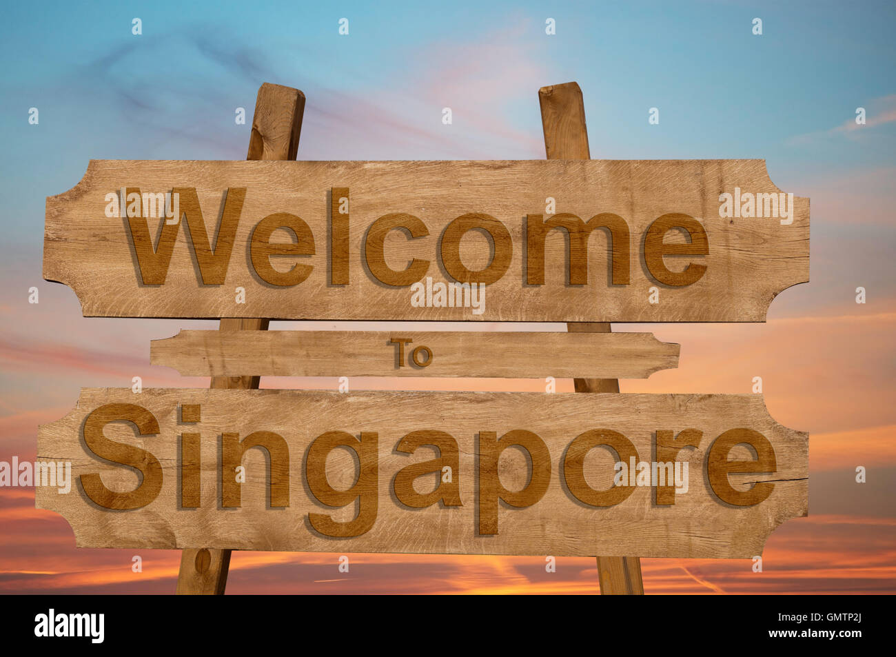 Welcome to Singapore sign on wood background Stock Photo - Alamy