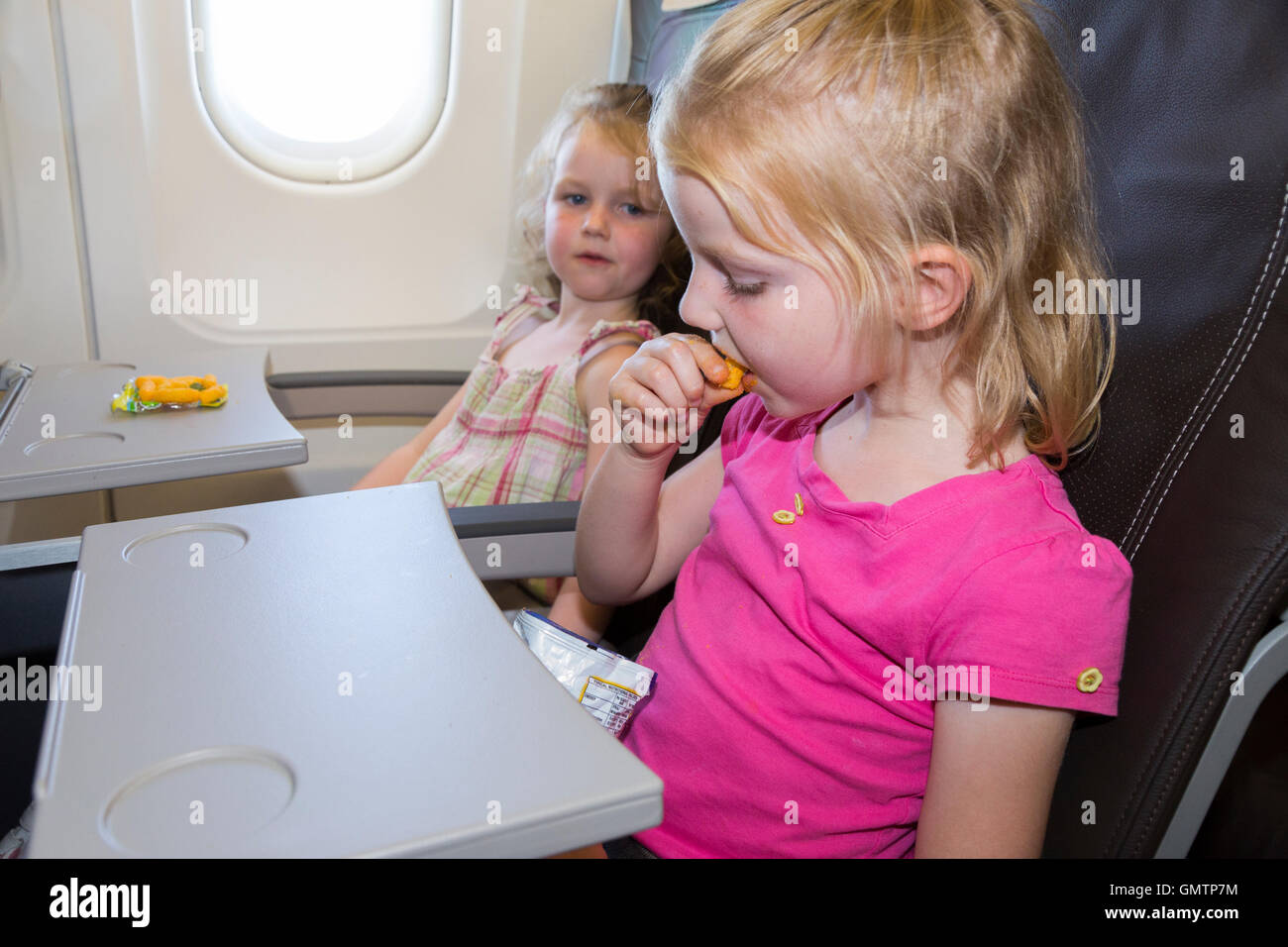 Child / two children age 6 & 4 go on holiday / vacation & eat snack ...