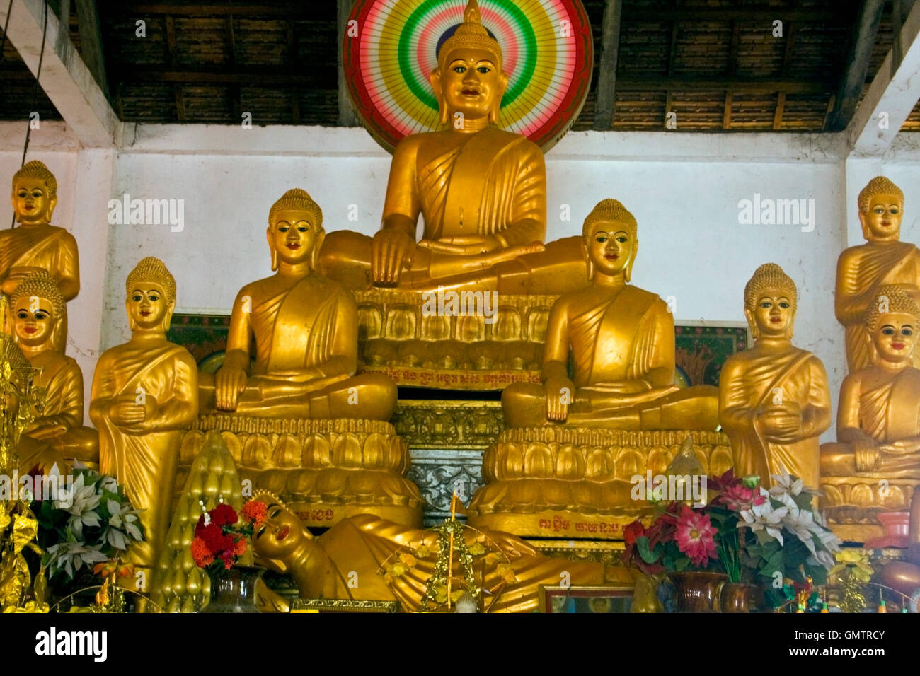 Buddha statues are on display inside a pagoda building at a Buddhist ...