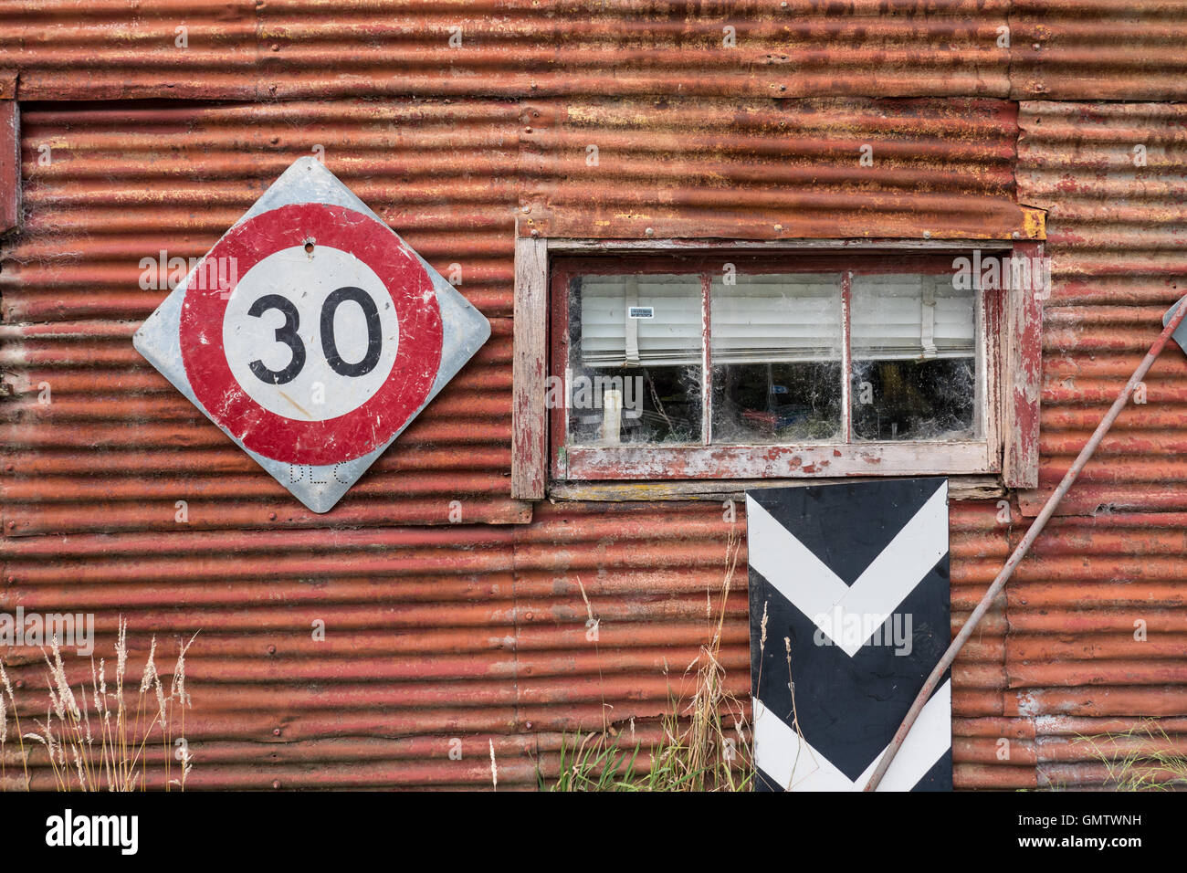 30 speed limit traffic signs on an old barn. Whangamomona, Taranaki ...