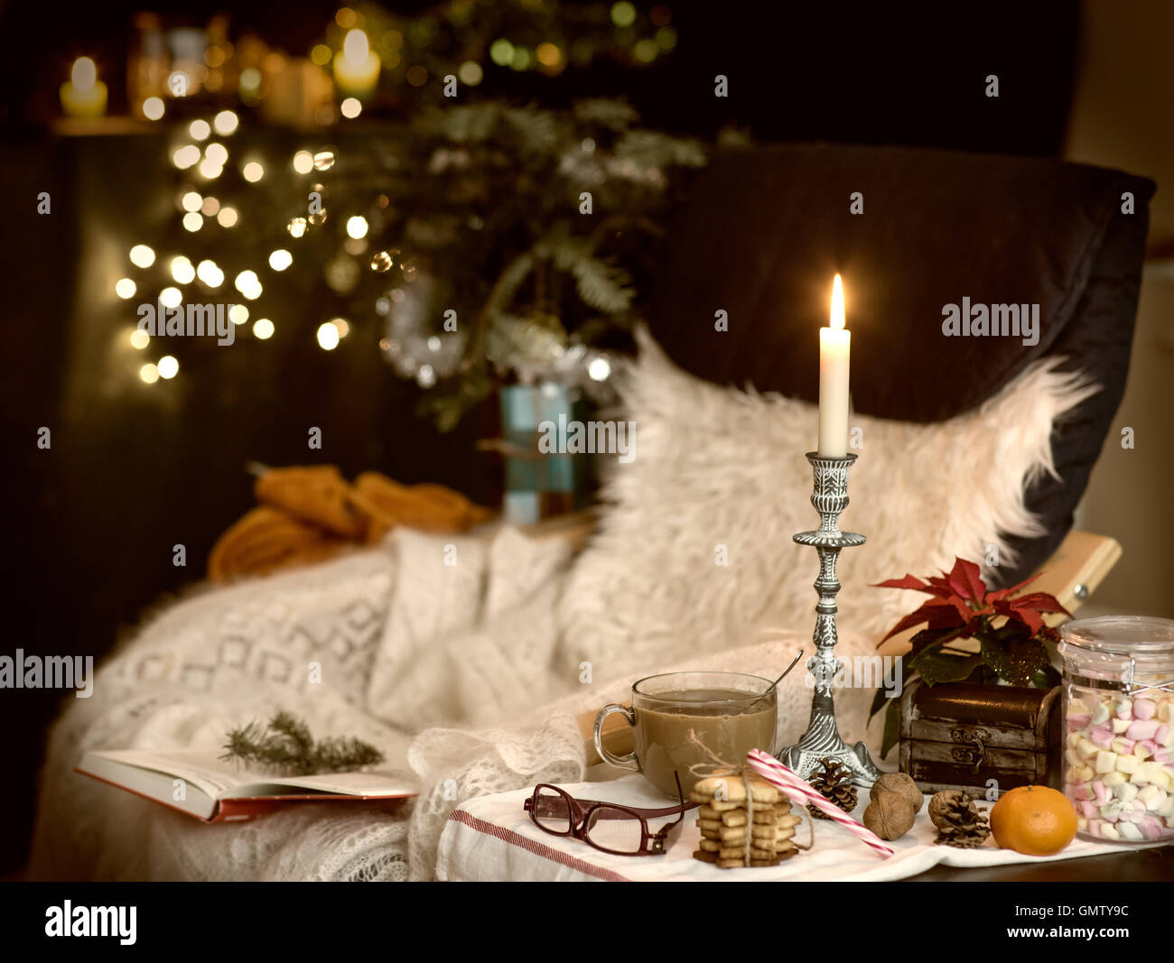 Comfortable place in decorated room for Christmas Stock Photo - Alamy