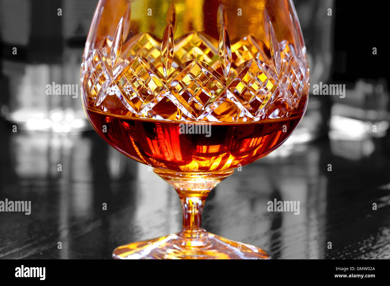 Glass of brandy selective color Stock Photo - Alamy