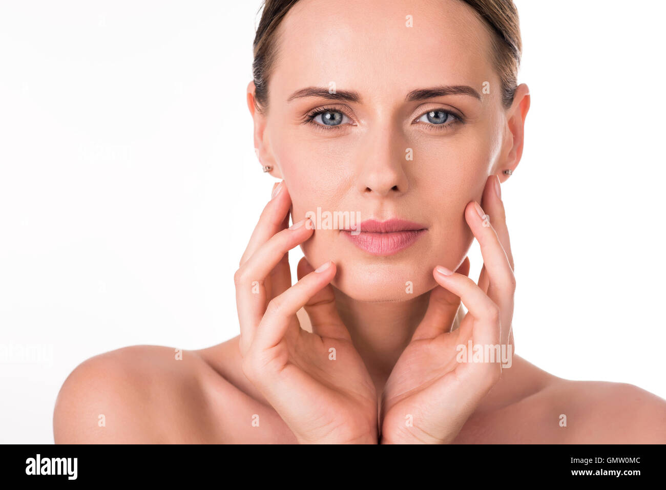 Positive young woman with natural makeup Stock Photo - Alamy
