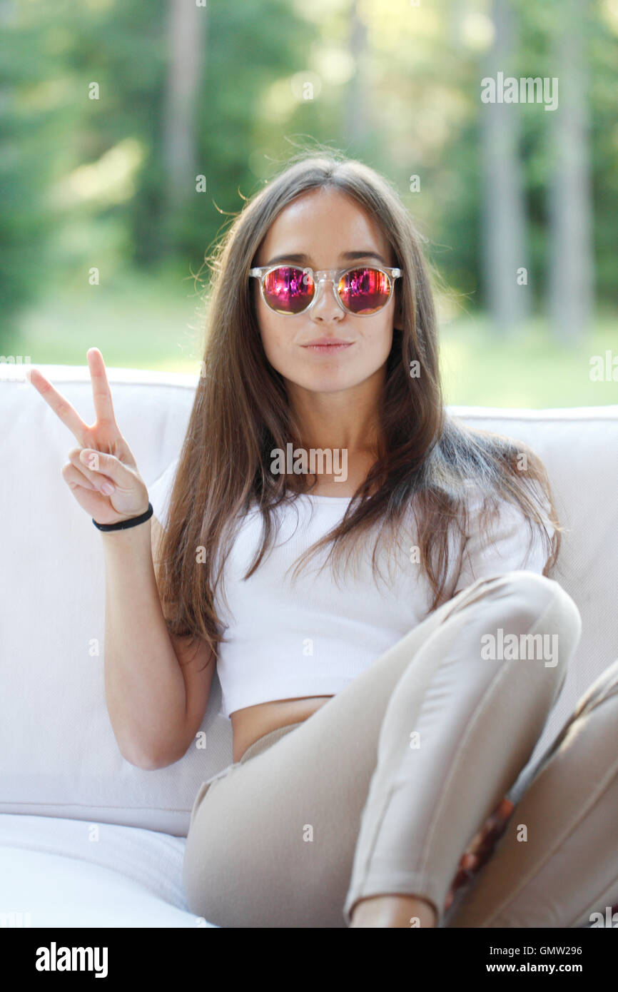 Girl victory symbol hi-res stock photography and images - Alamy