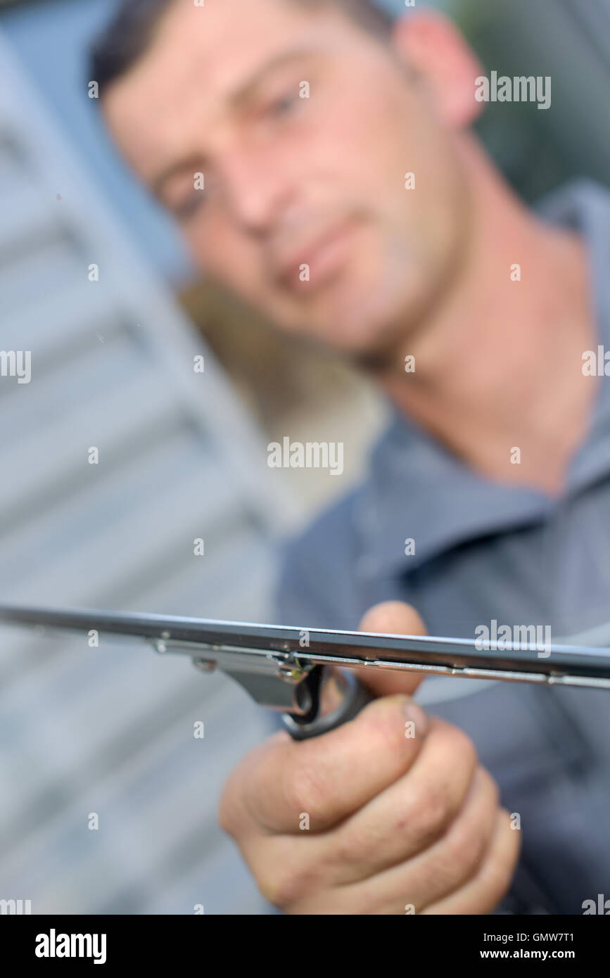 man with squeegee Stock Photo - Alamy