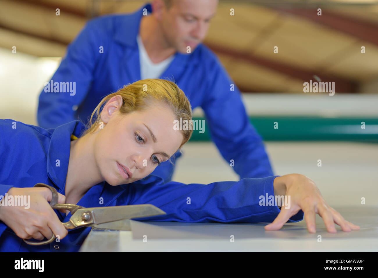 Cutting tarpaulin hi-res stock photography and images - Alamy
