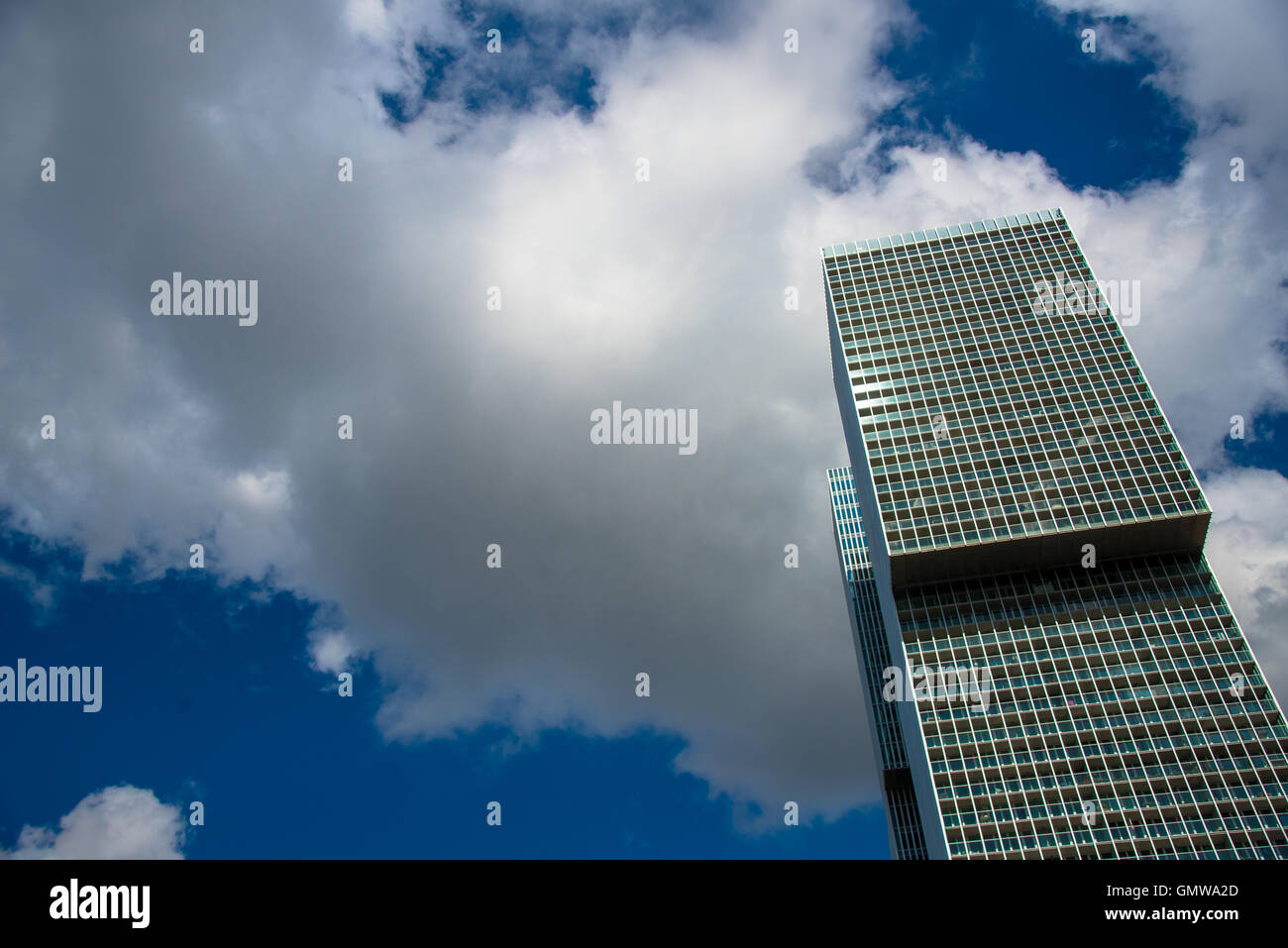 skyscraper in rotterdam holland with clouds and blue sky Stock Photo ...