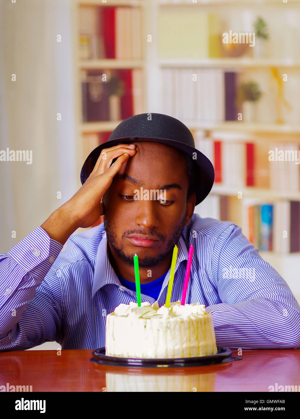 Birthday party hat sad old man hi-res stock photography and images - Alamy