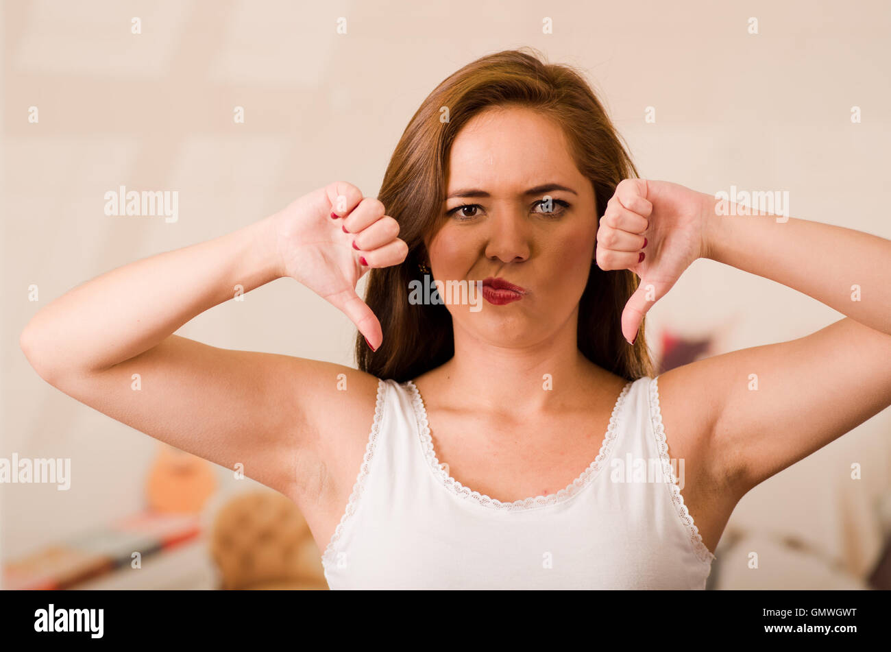 Young female worried facing camera hi-res stock photography and images - Alamy