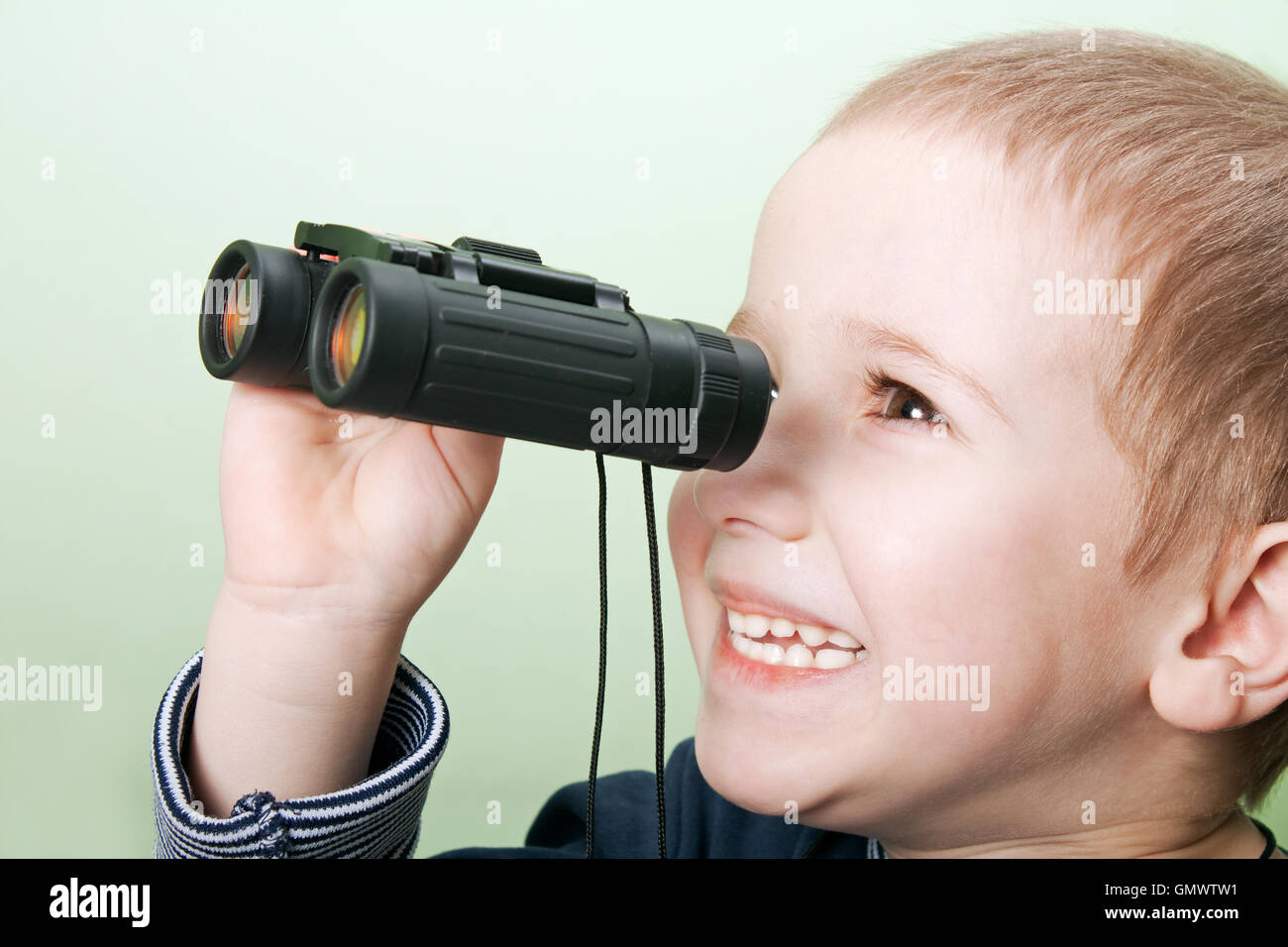 Child with binoculars Stock Photo - Alamy