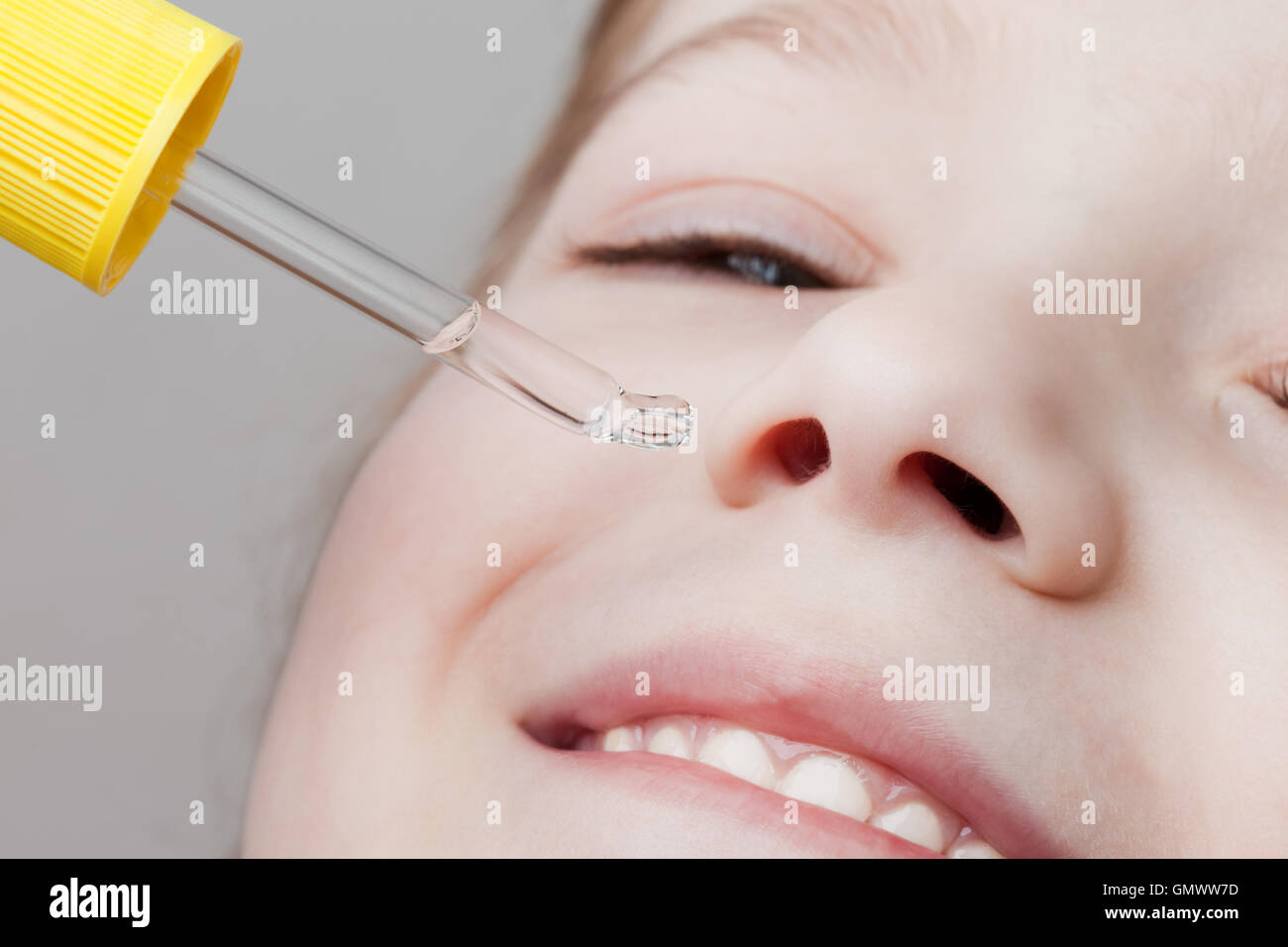 Applying nasal dropper Stock Photo - Alamy