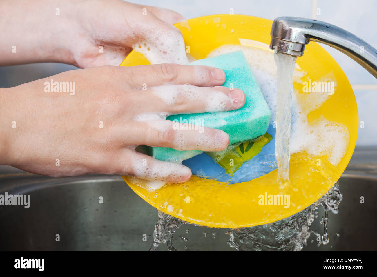 Dish cleaner hi-res stock photography and images - Alamy
