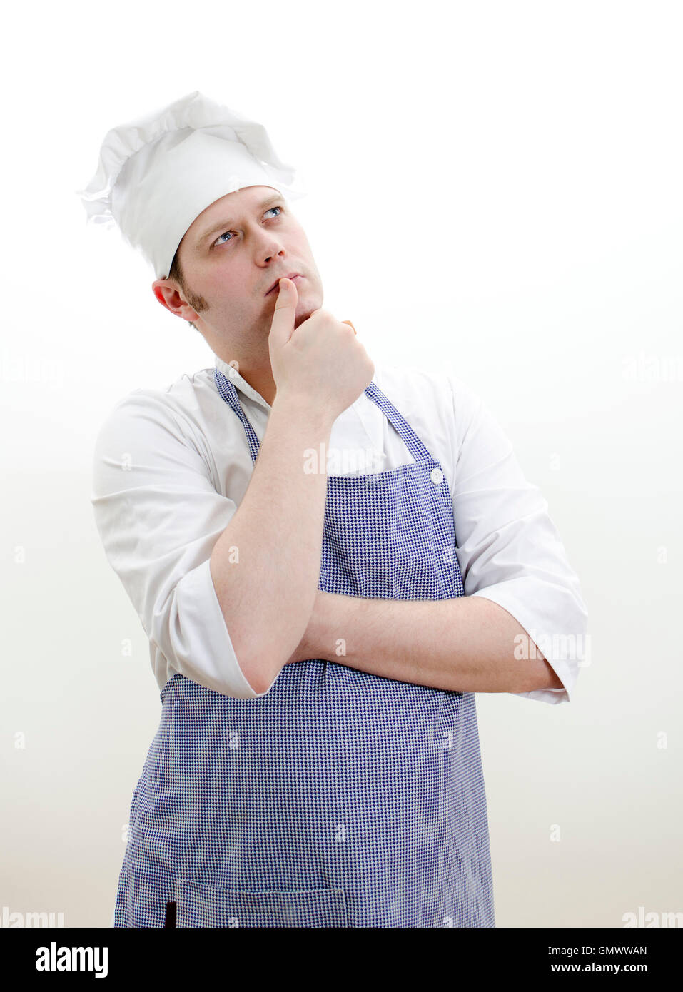 Portrait of thinking chief cook Stock Photo - Alamy