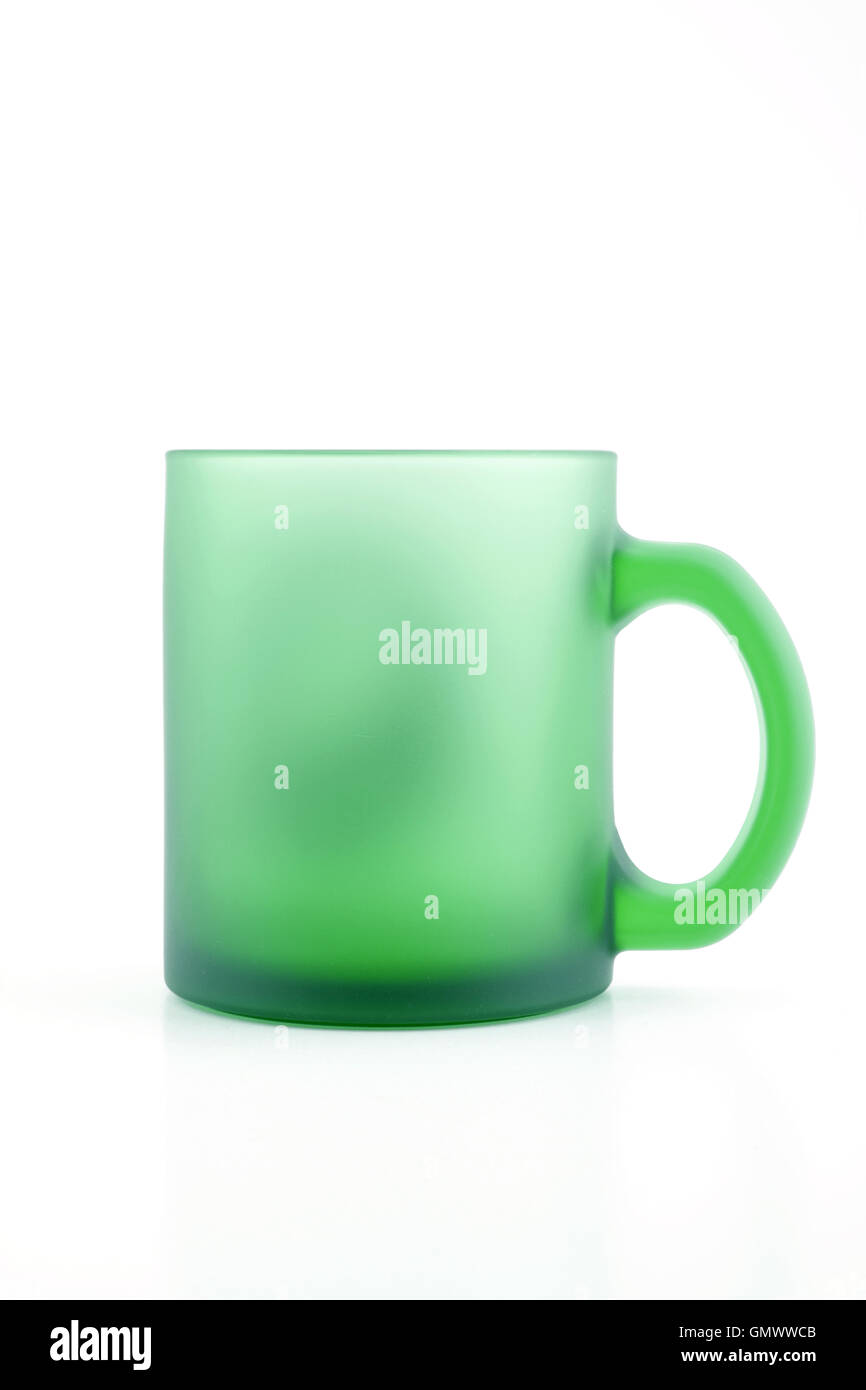 Green mat glass cup isolated on white Stock Photo - Alamy