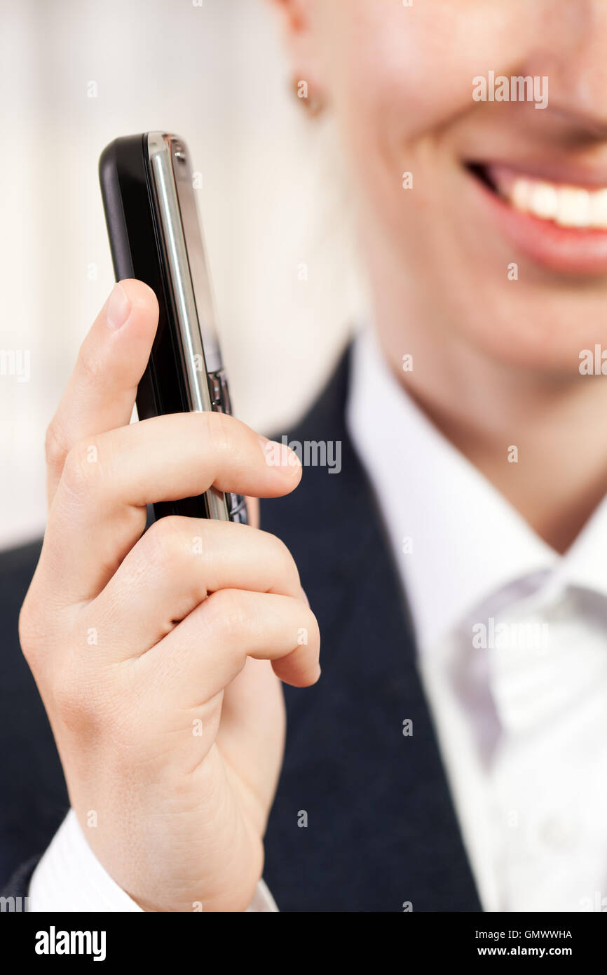 Mobile phone in women hand Stock Photo - Alamy