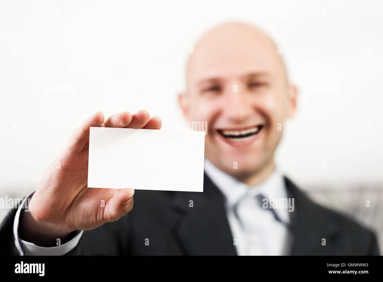 Blank card in man hand Stock Photo - Alamy